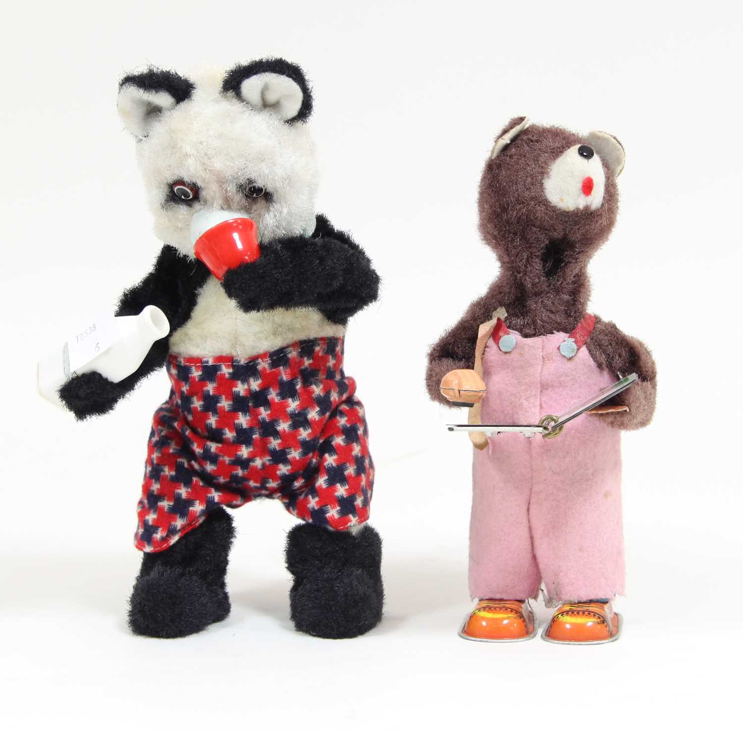 Lot 667 - A Japanese clockwork toy modelled as a panda