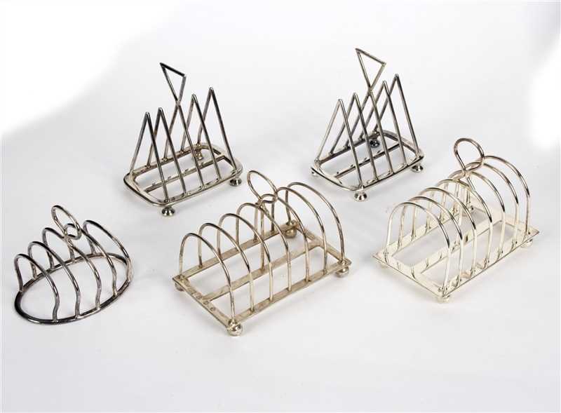 Lot 9 - A silver toast rack, Hamilton & Inches,