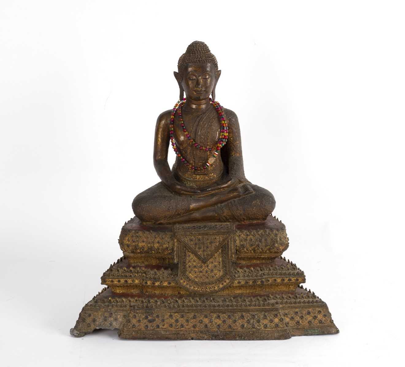 Lot 321 - A Thai metal Buddha seated cross-legged on a