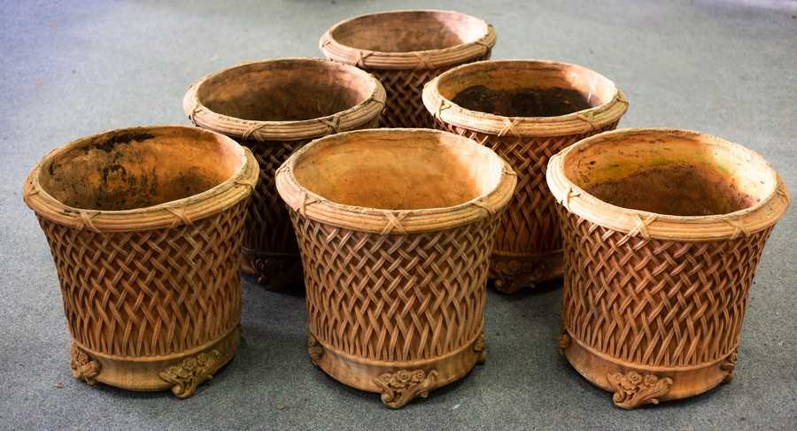 Lot 508 - Six terracotta lattice pots, 52cm high