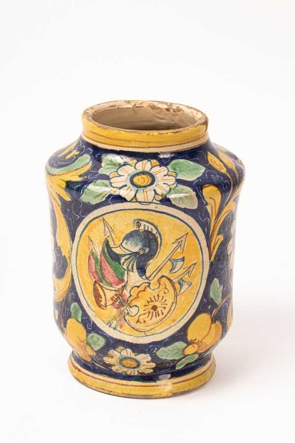Lot 558 - An Italian polychrome maiolica albarello, in