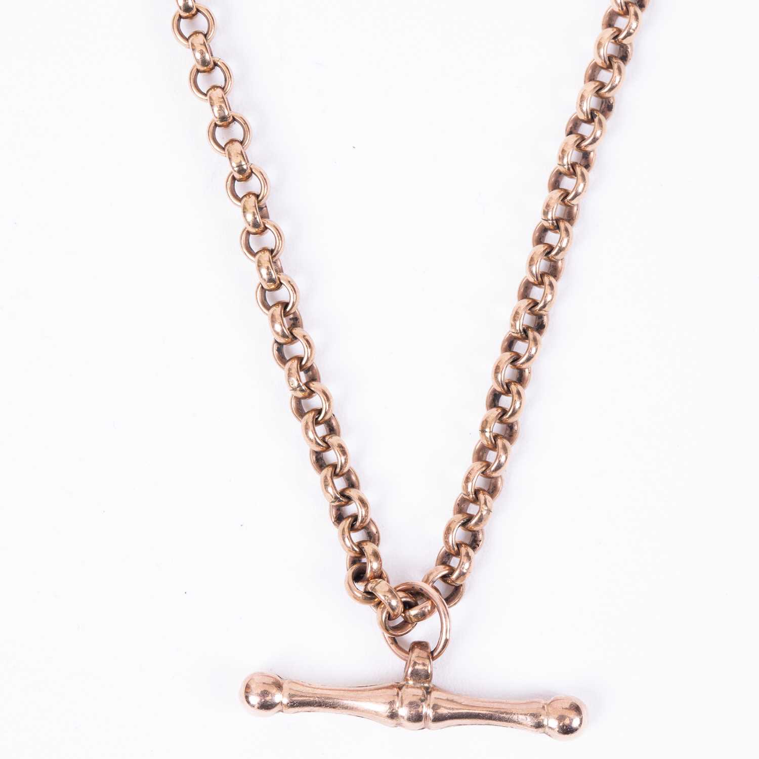 Lot 110 - A 9k rose gold watch chain