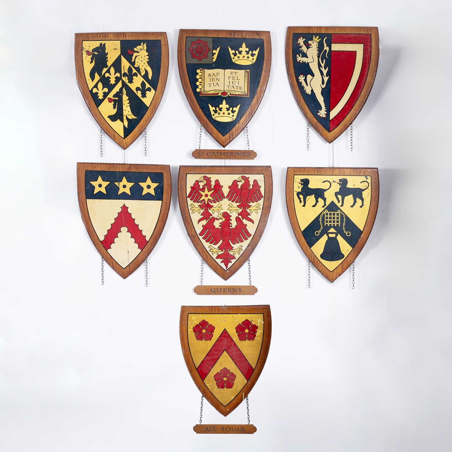 Lot 8 - A collection of painted wood university